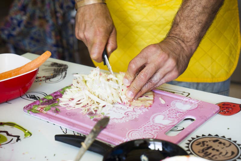 Man with Knife is Going To Cook Breakfast from Different Vegetables ...