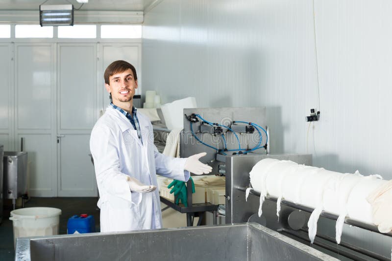 Man in Lab Coat at Dairy Production Process. Stock Photo - Image of ...