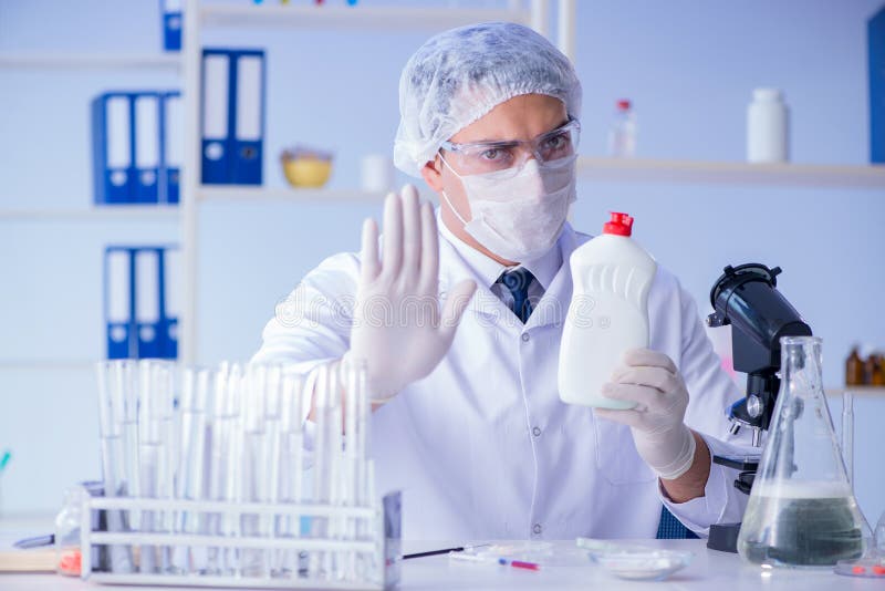 The Man in the Lab Testing New Cleaning Solution Detergent Stock Photo ...