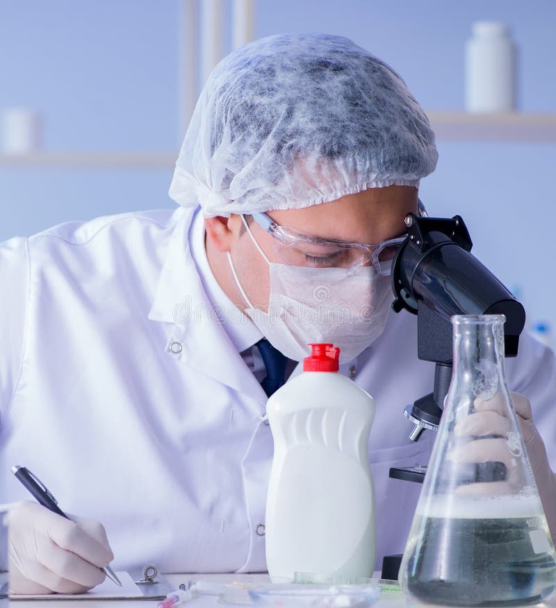 Man in the Lab Testing New Cleaning Solution Detergent Stock Photo ...