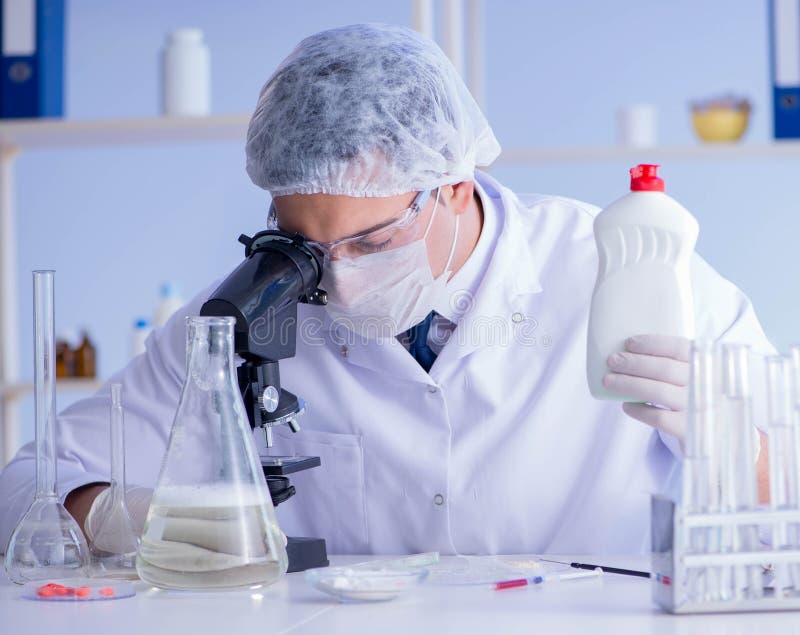 Man in the Lab Testing New Cleaning Solution Detergent Stock Photo ...