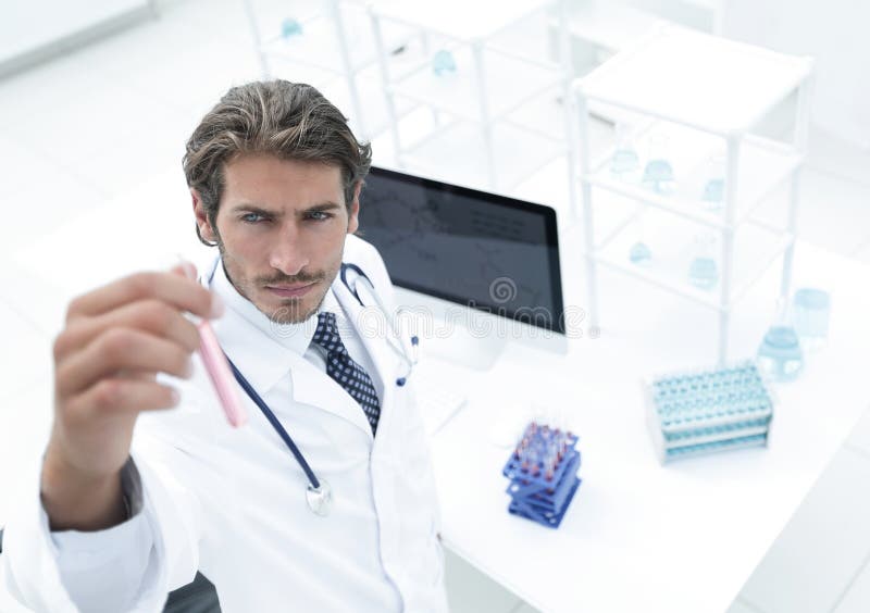 Man in Laboratory Checking Test Tubes Stock Image - Image of chemistry ...