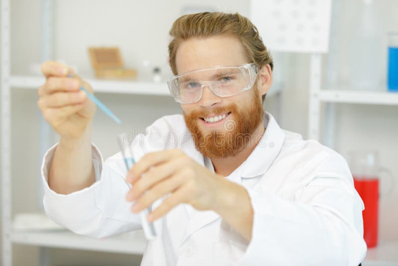Man in Laboratory while Performing Experiments Stock Photo - Image of ...