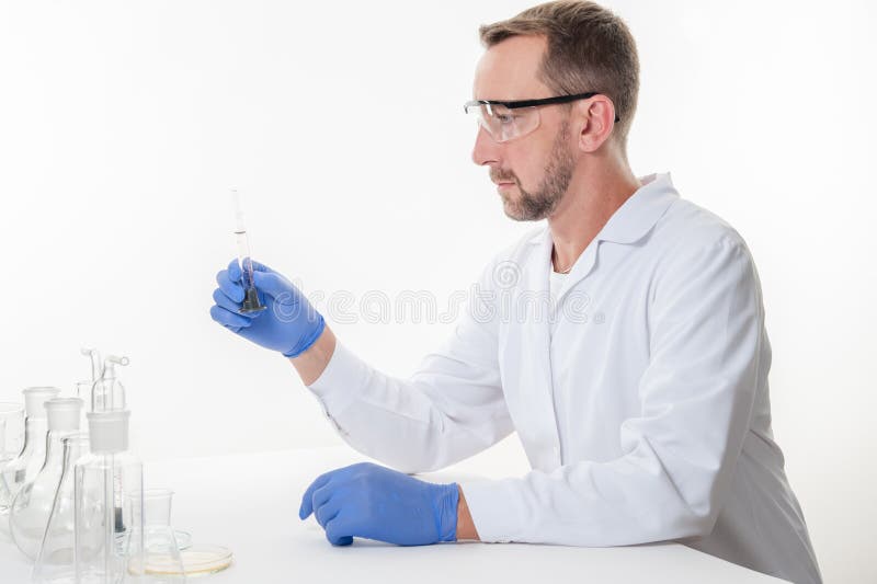 Man in the Laboratory, View of a Man in the Laboratory while Performing ...