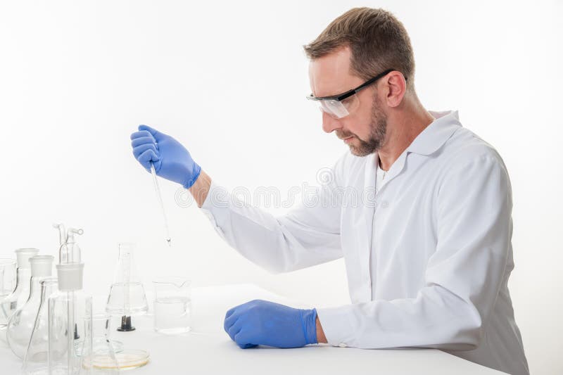 Man in the Laboratory, View of a Man in the Laboratory while Performing ...