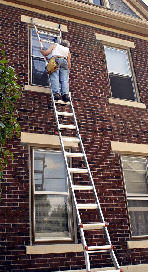 Man on Ladder stock photo. Image of fall, ascended, elevation - 9923718