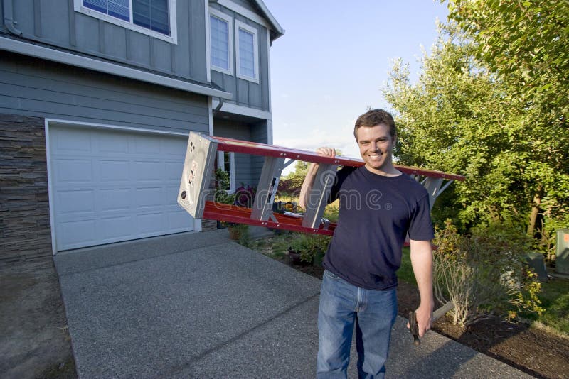 Man with Ladder and Hammer stock photo. Image of male - 6201990