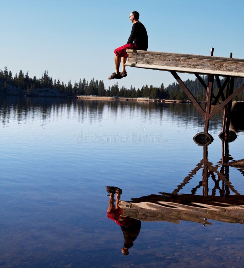 Man on the lake stock photo. Image of leisure, rest, water - 54179430