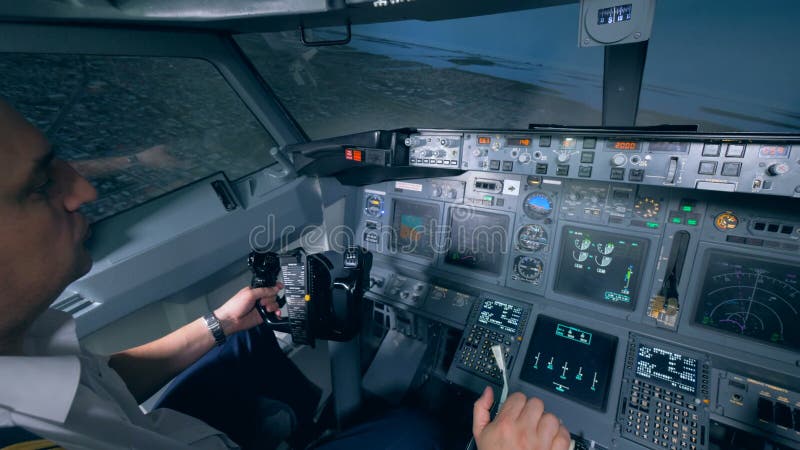 A Person Holds a Steering Wheel in a Plane Simulator, Close Up. Stock ...