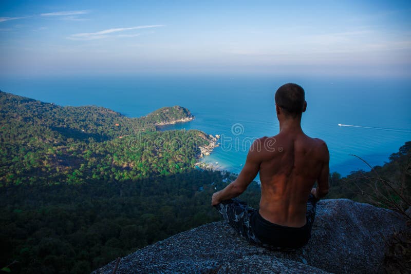 Man in a landscape stock image. Image of aerial, cliff - 77326753