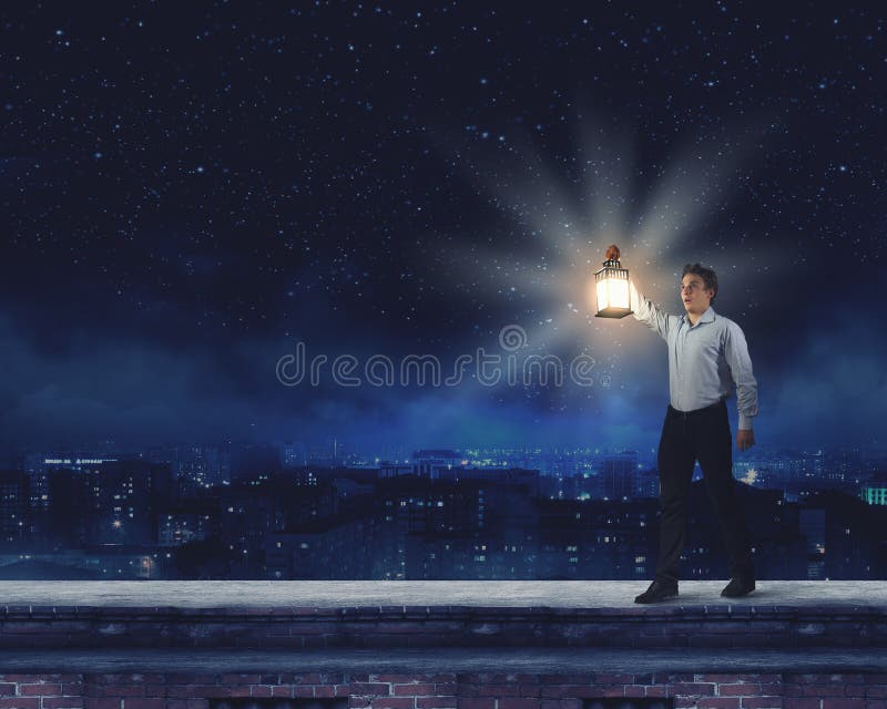 Man with lantern stock image. Image of illuminate, male - 47320981