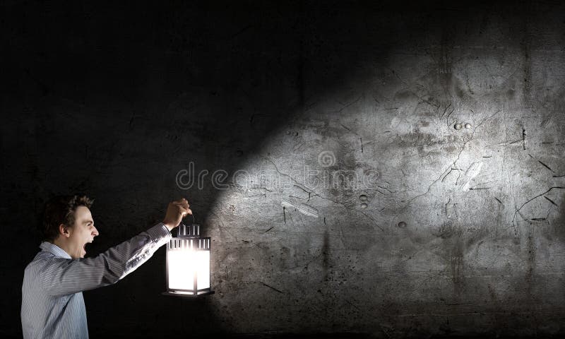 Man with lantern stock photo. Image of enlighten, courage - 50231616