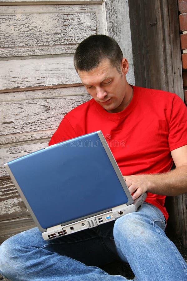 Man with Laptop stock photo. Image of outdoor, urban, computer - 1042448
