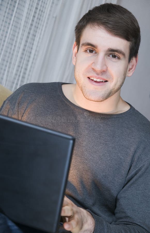 Man at the laptop stock photo. Image of attractive, handsome - 23567992