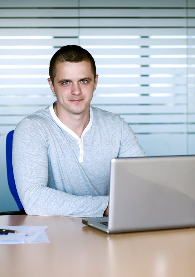 A man with laptop stock photo. Image of shirt, computer - 25196788