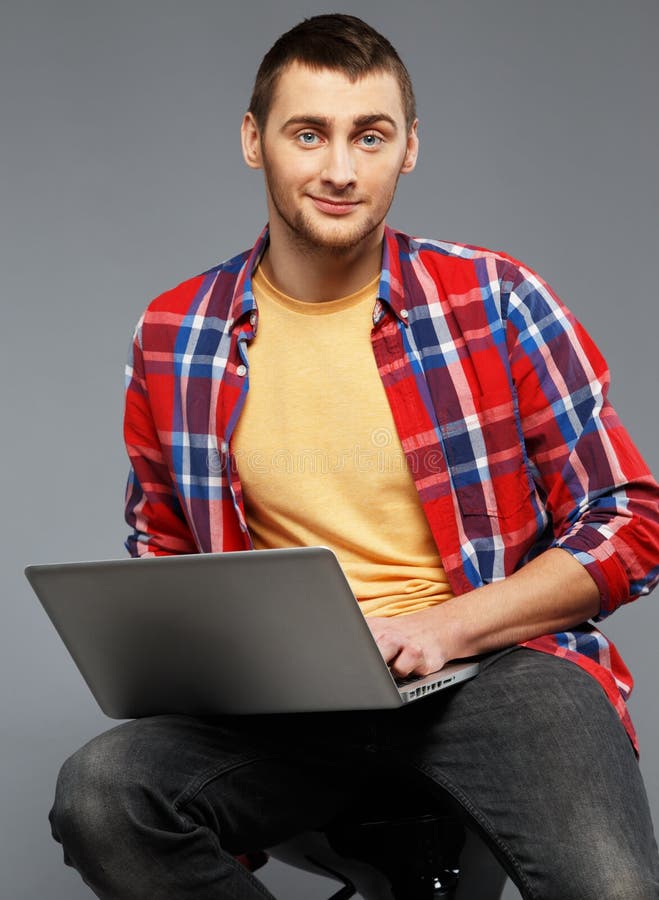 Man with a laptop stock image. Image of wifi, casual - 37843315