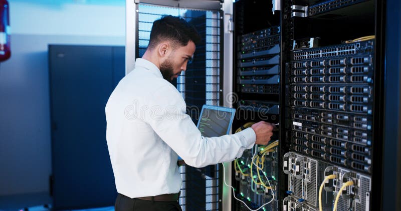 Man, Laptop and Cable Inspection in Server Room, System or Coding ...