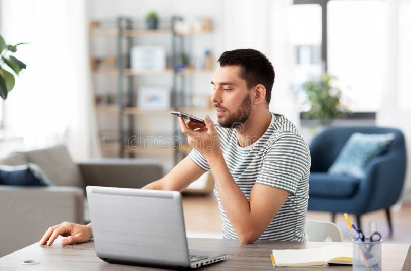 Man with Laptop Calling on Phone at Home Office Stock Image - Image of ...