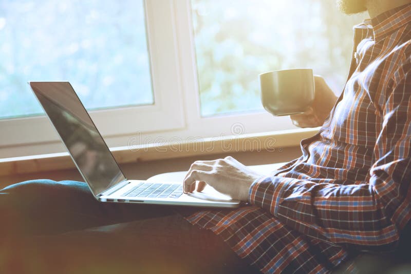 Man with Laptop Drinking Coffee Stock Photo - Image of networking ...