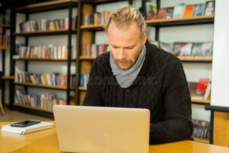 Man with Laptop Indoors Use Internet Stock Photo - Image of smile ...