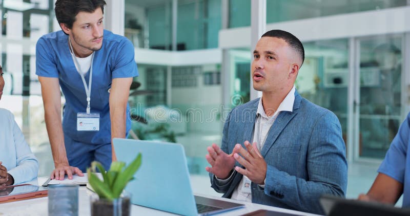 Man, Laptop and Medical Training with Teamwork in Hospital for ...