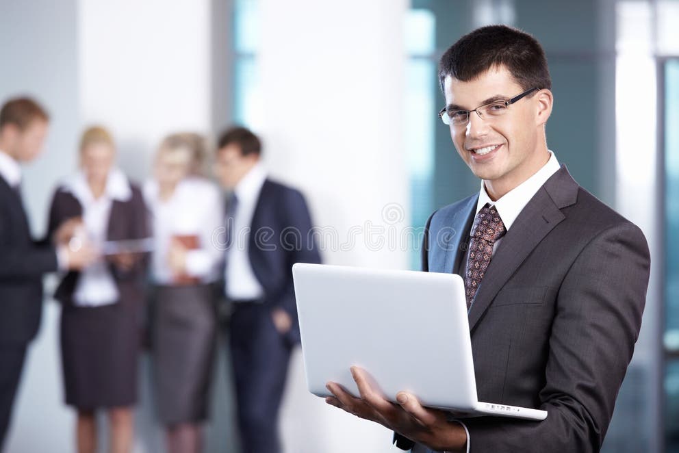 Man with Laptop in the Office Stock Image - Image of businessman ...