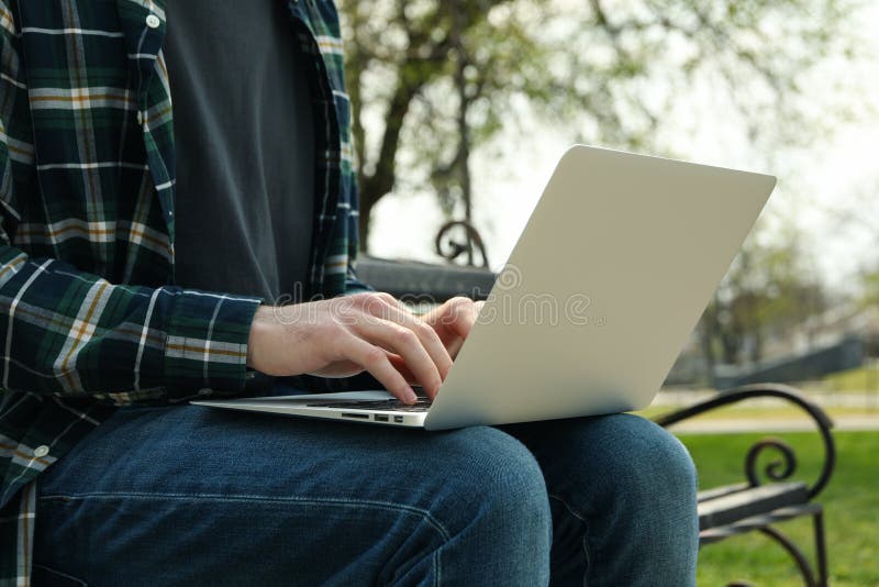 Man with Laptop Works in Park Outdoor Work Stock Photo - Image of ...