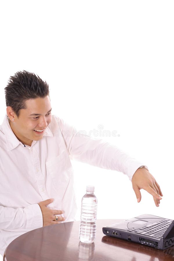 Man laughing at an email stock photo. Image of email - 42537594