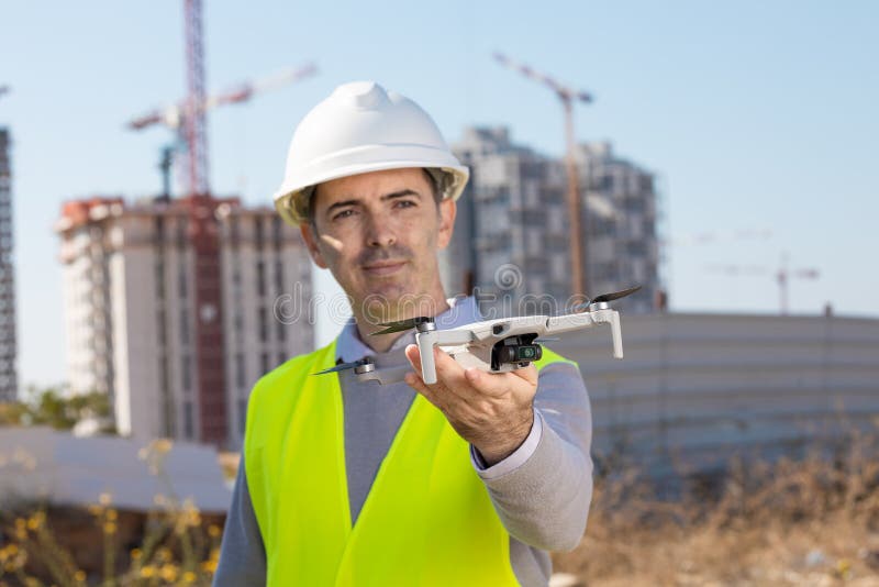 Man launches a quadcopter stock photo. Image of check - 261205672