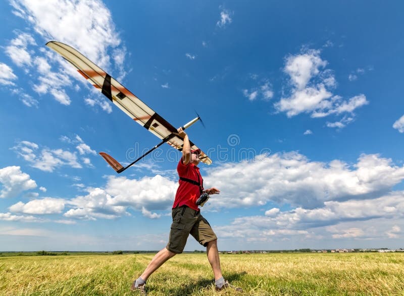 Man Launches into the Sky RC Glider Stock Image - Image of outside ...