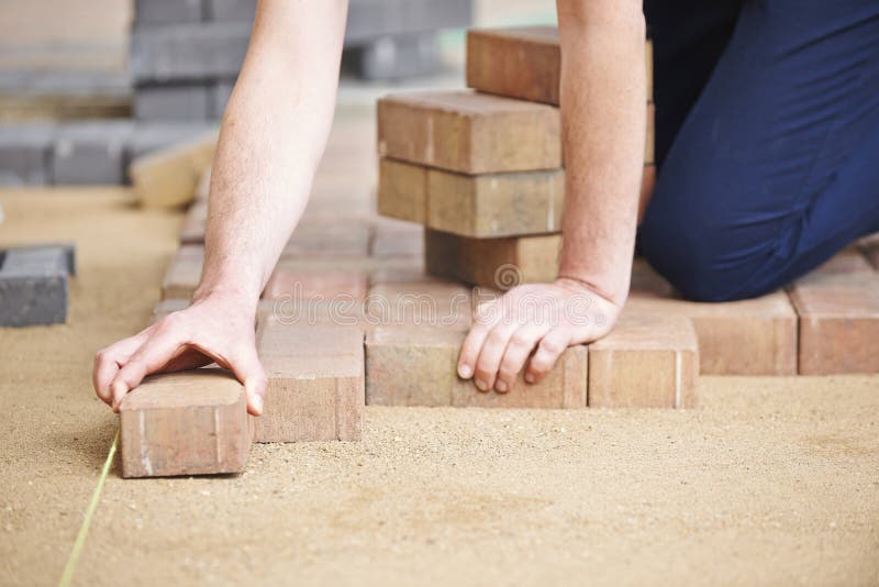 Man Laying Blocks for Patio Stock Image - Image of craftsperson ...