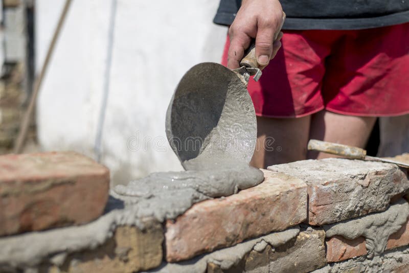 Man Laying Concrete Block Wall Stock Images - Download 656 Royalty Free ...