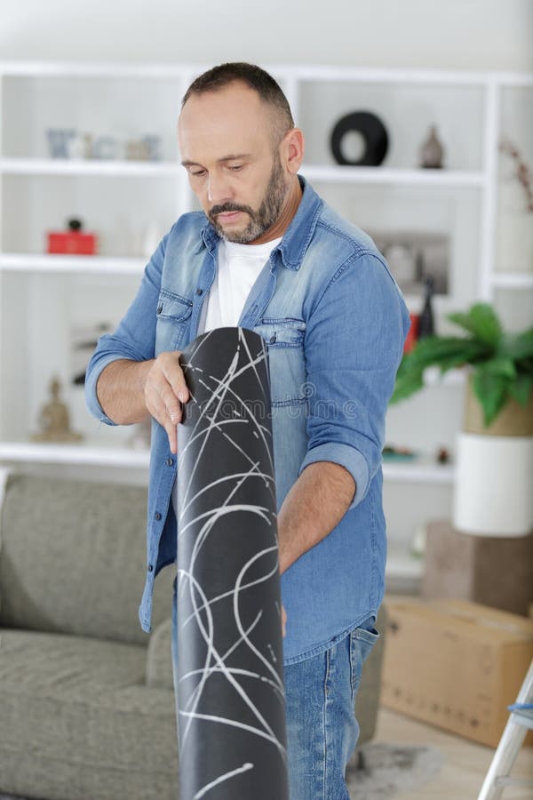 Man laying carpet stock photo. Image of manual, plan - 280479304