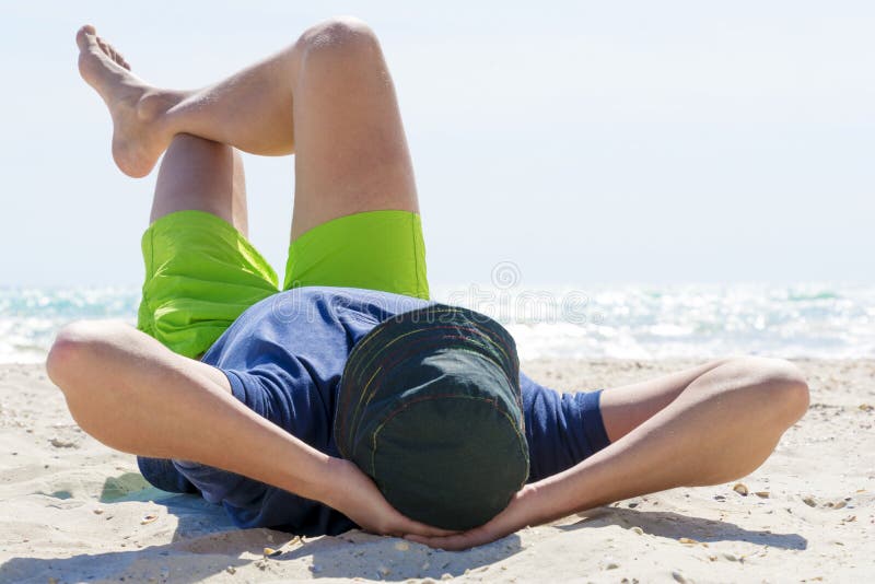 Man Laying Seacoast Stock Photos - Free & Royalty-Free Stock Photos ...