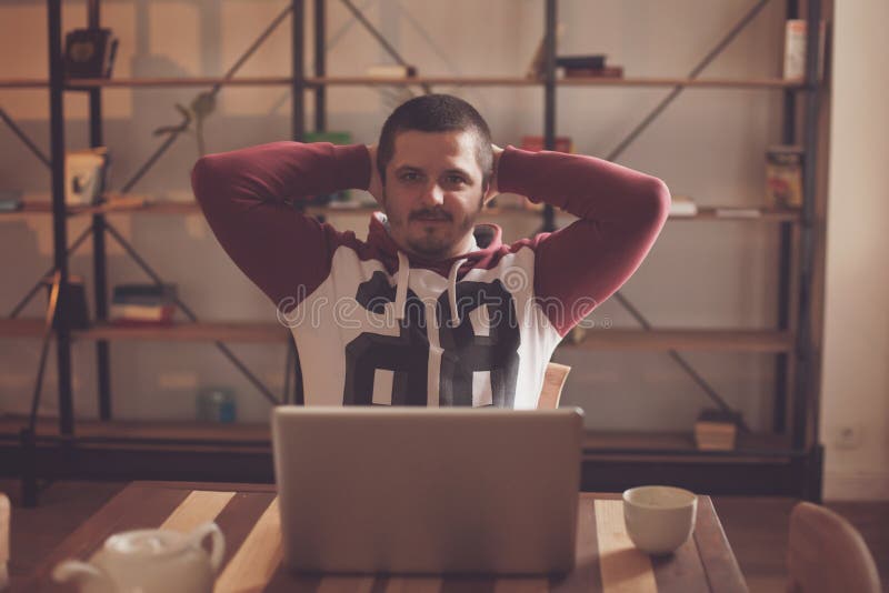 Man leans back stock image. Image of table, positive - 82991813