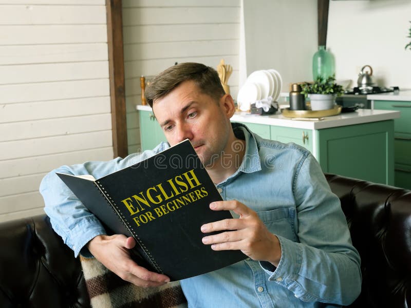 Man Learning with English for Beginners Book. Stock Photo - Image of ...