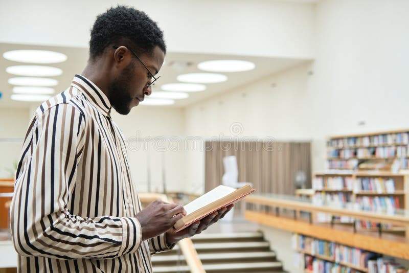 Man Learning in the Library Stock Photo - Image of indoors, student ...