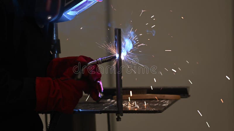 A Man Learns the Craft of Welding on a Sample. Stock Footage - Video of ...