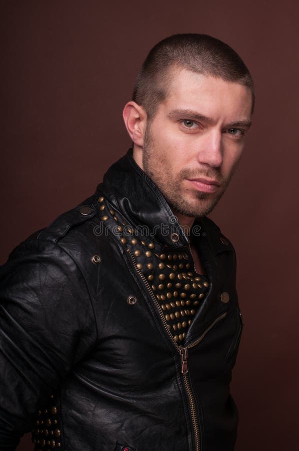 Fashion Model in Leather Jacket with Hands in His Pockets Stock Photo ...