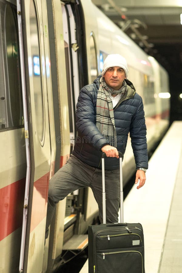 Man leaving by train stock photo. Image of commuting - 109407014