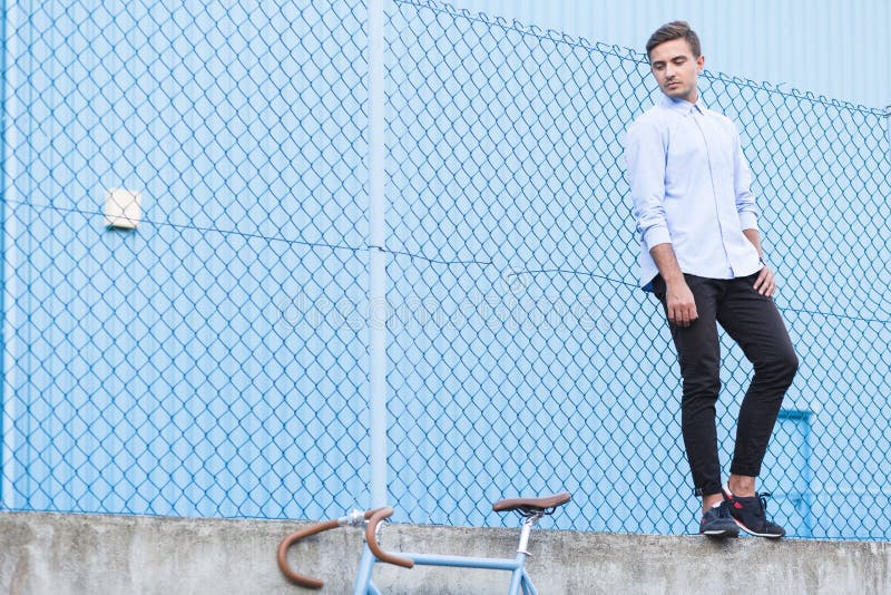 Man on ledge stock photo. Image of lifestyle, person - 67608232