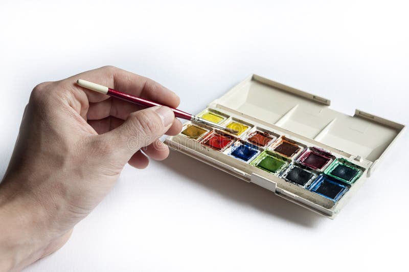 Man Left Hand Using Watercolor Set with Paintbrush Stock Image - Image ...