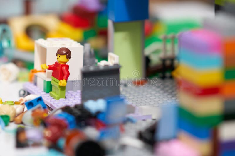 Man lego toy on plate editorial image. Image of path - 117960350
