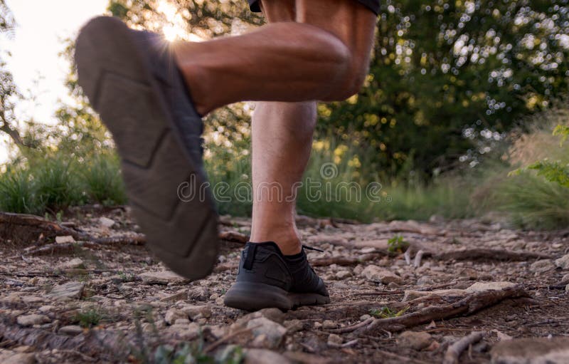 Man Legs Running on Trail in the Mountains Stock Image - Image of ...