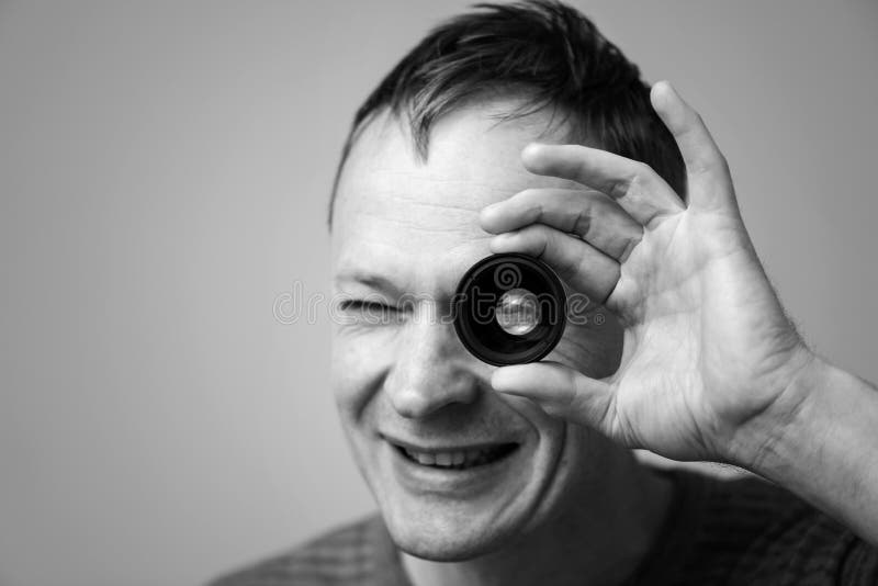 The man with a lens stock image. Image of filter, closeup - 137864241