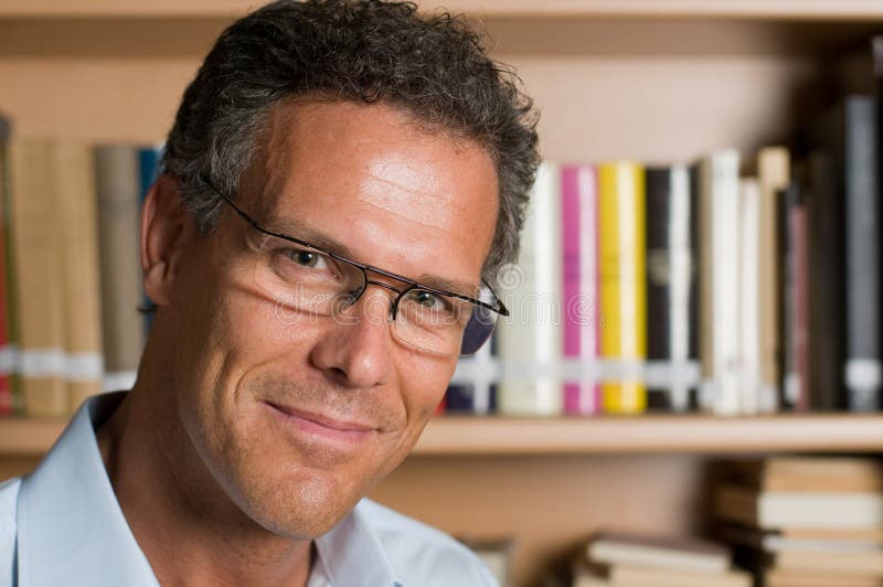 Man in library stock image. Image of librarian, bookstore - 9915557