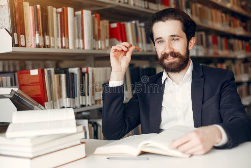 Handsome Guy Study at the Library Stock Photo - Image of literature ...