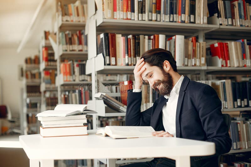 Handsome Guy Study at the Library Stock Photo - Image of happy, adult ...