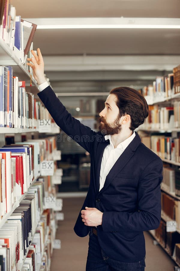 Handsome Guy Study at the Library Stock Image - Image of library, high ...