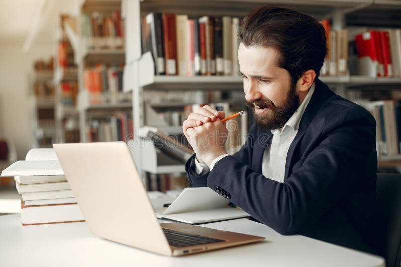 Handsome Guy Study at the Library Stock Photo - Image of concentration ...